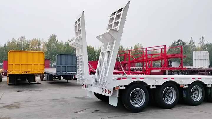 China high strength 4 axles 17m 25m flat bed trailer 80t telescopic low ...