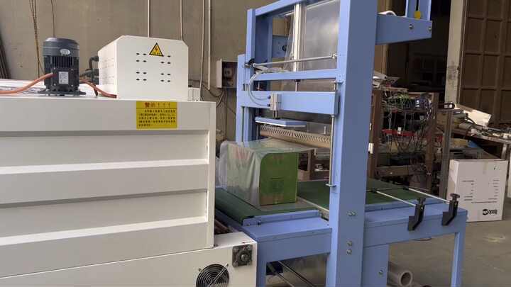 Automatic Frontal Feeding Sleeve Packing Machine by Forlong