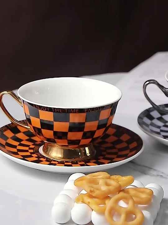 Vintage style Ceramic Coffee cup and saucer set with a checker board ...