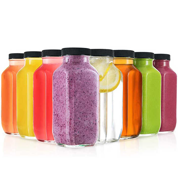 Bouteilles d'eau en verre avec couvercles, conservation des jus ...