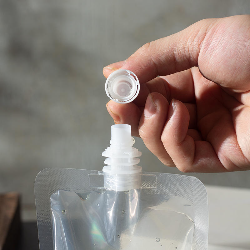 In Stock Liquid Plastic Packaging Clear Transparent Nozzle Bag Stand up ...