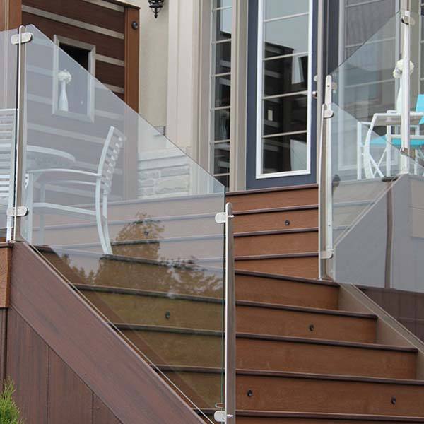 Minimalist Glass Railing System With Stainless Steel Supports and ...