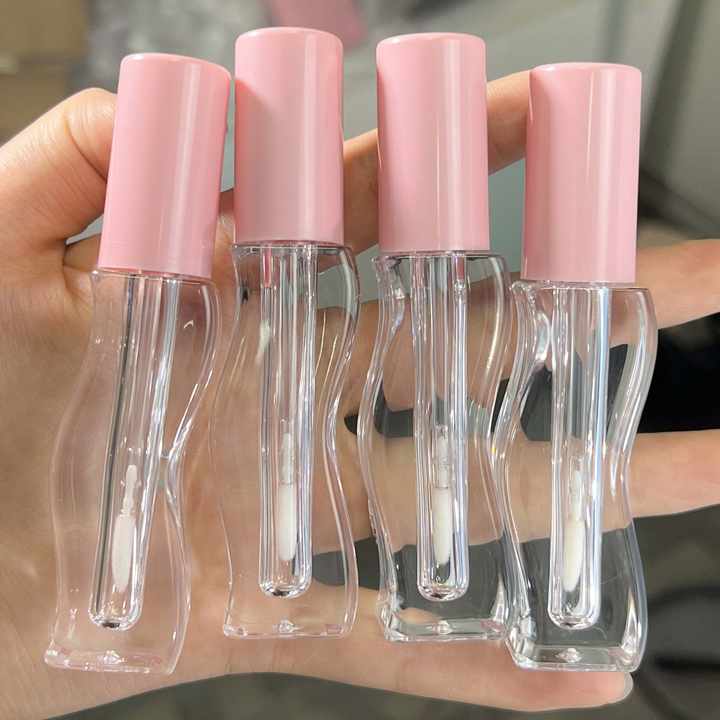 New Design Wave Clear Lip Gloss Bottle with Baby Pink Cap