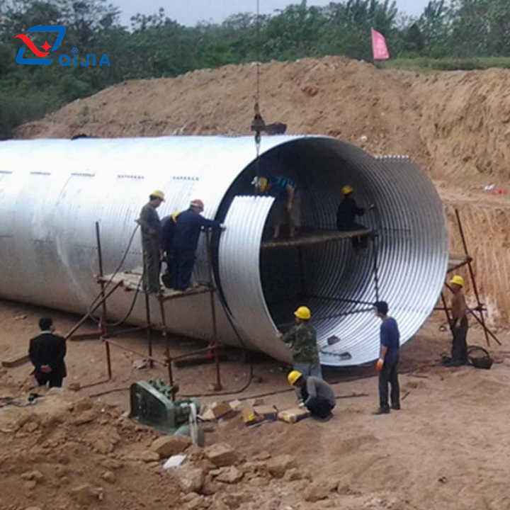 Buried under-ground road culvert assembly corrugated galvanized steel ...
