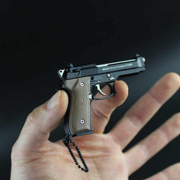Mini Metal Gun Keychain - Fashion & Collectible Item