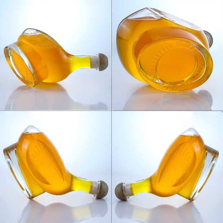 Artistic Curved Glass Beverage Bottle Unique Shape Ideal for Whiskey ...