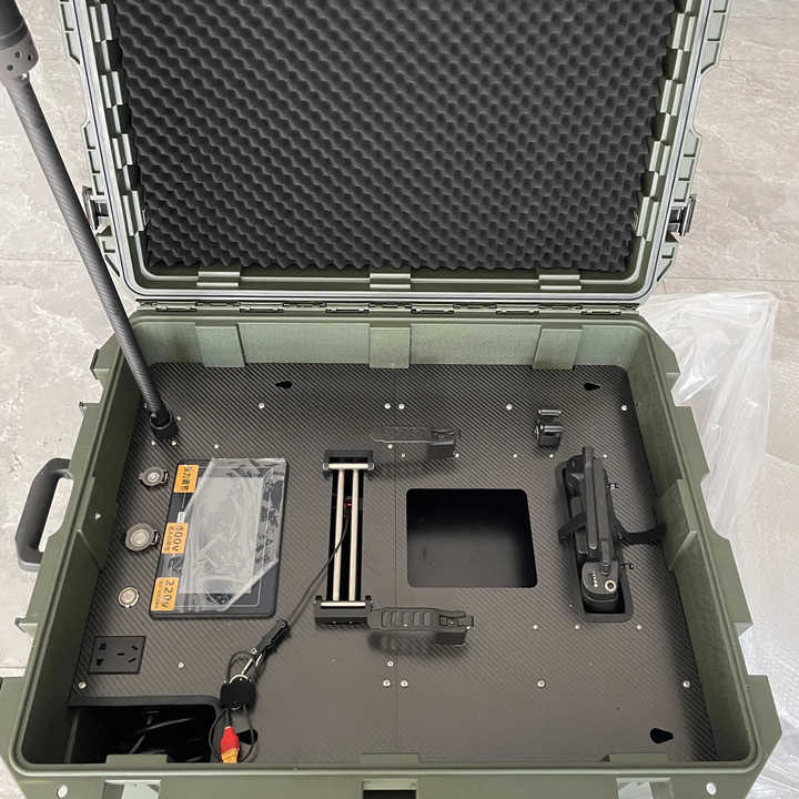 Integrated tethered unmanned aerial vehicle lighting system, used for ...