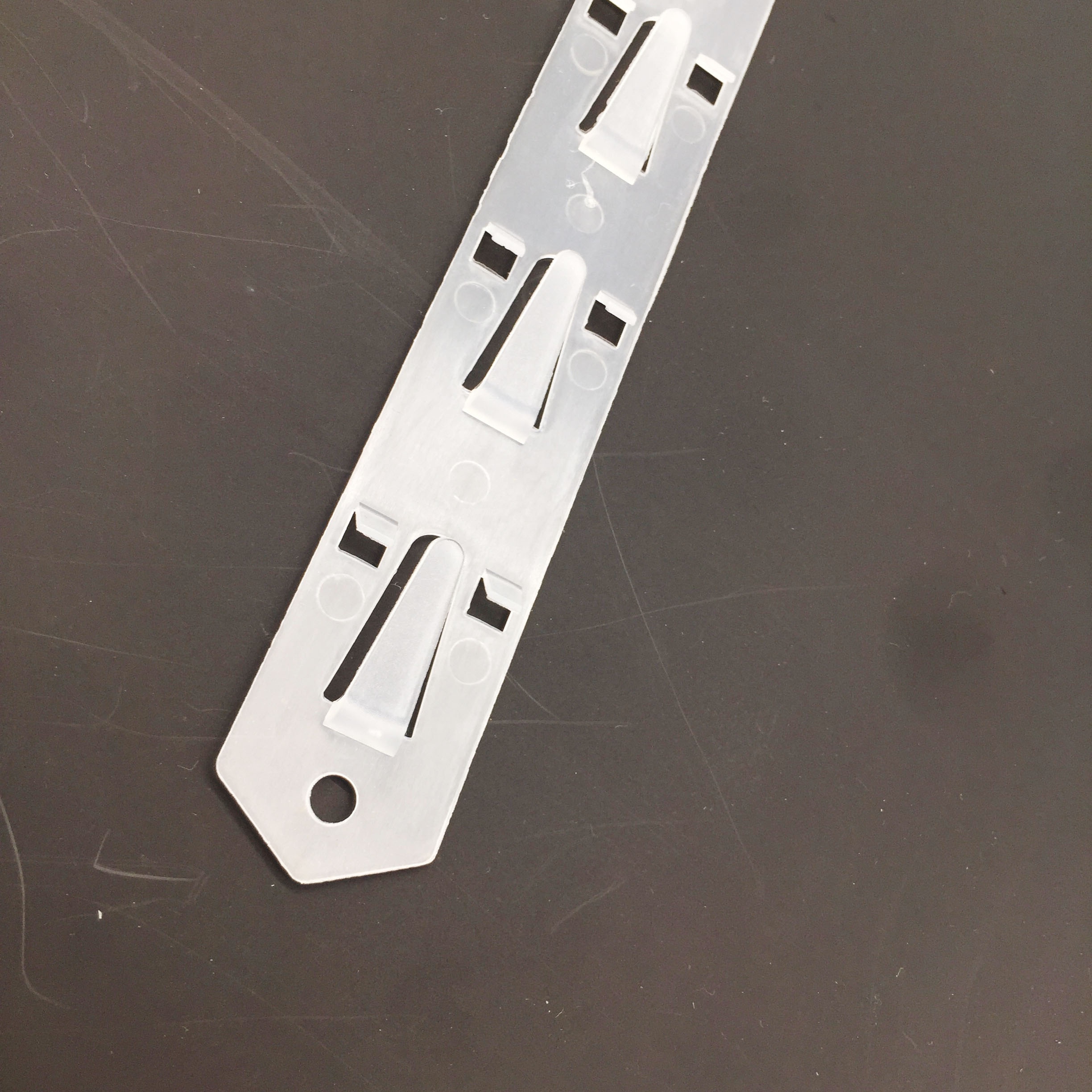 Clip Strip - Plastic Hanging Display for Retail Store