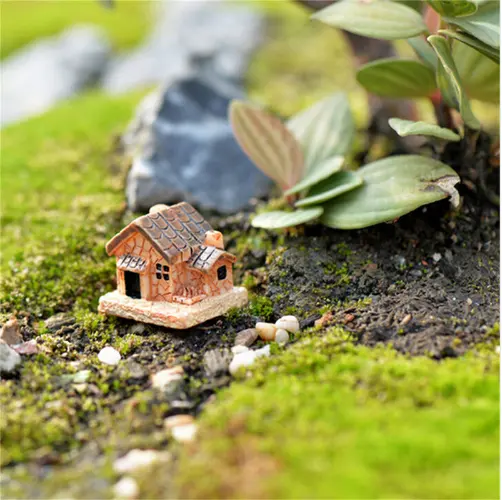 Miniature Fairy Cottages In Terrariums