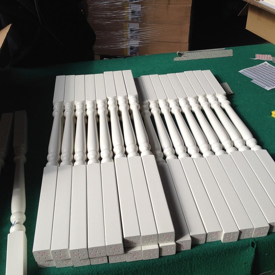 White Primed Stop Chamfer Colonial Spindles for Modern Staircases