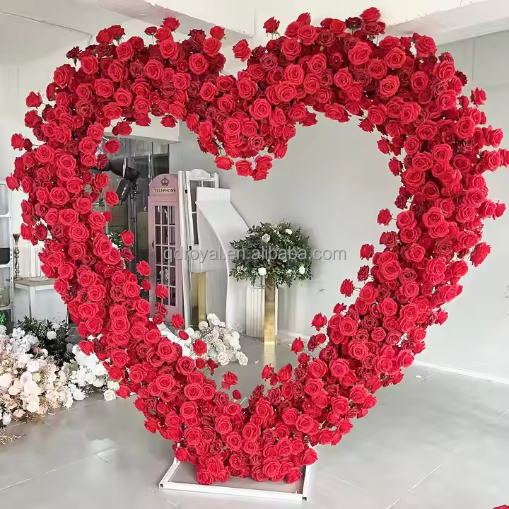 Elegant Heart-Shaped Stage Backdrop with Red Roses