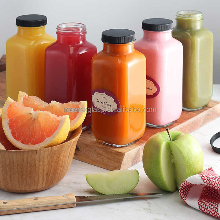 Bouteilles d'eau en verre avec couvercles, conservation des jus ...