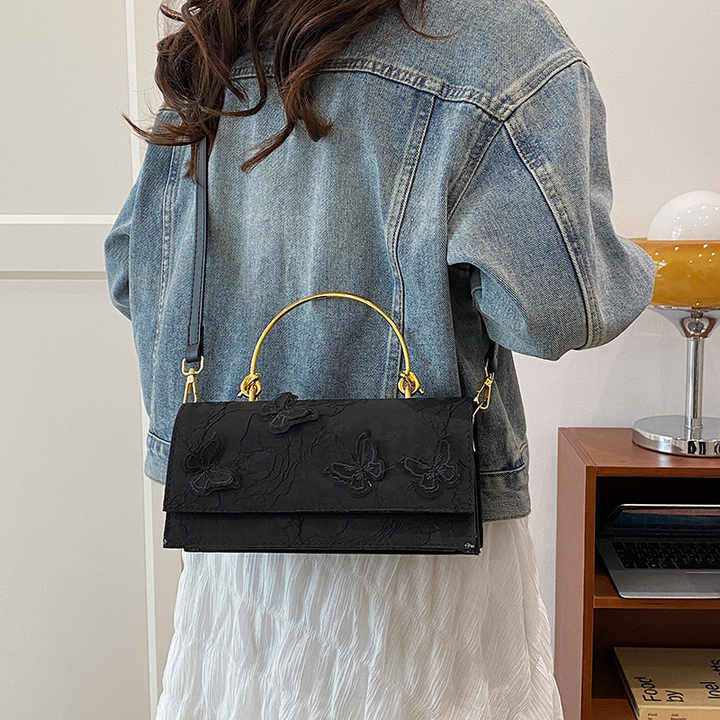 Shop Our Collection of Metal Top Handle Butterfly Bags