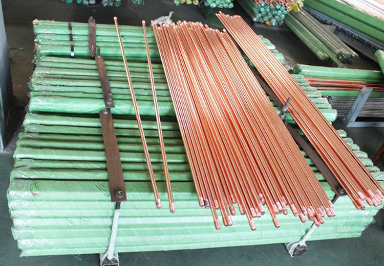 Installing grounding rods for high-voltage lightning protection ...