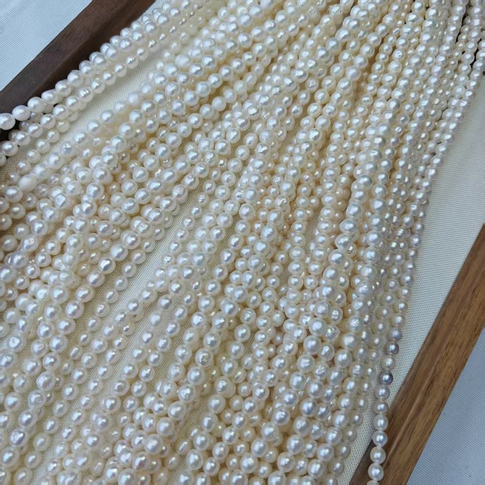High Luster 5-6mm Round White Zhuji Freshwater Full-drilled Semi ...