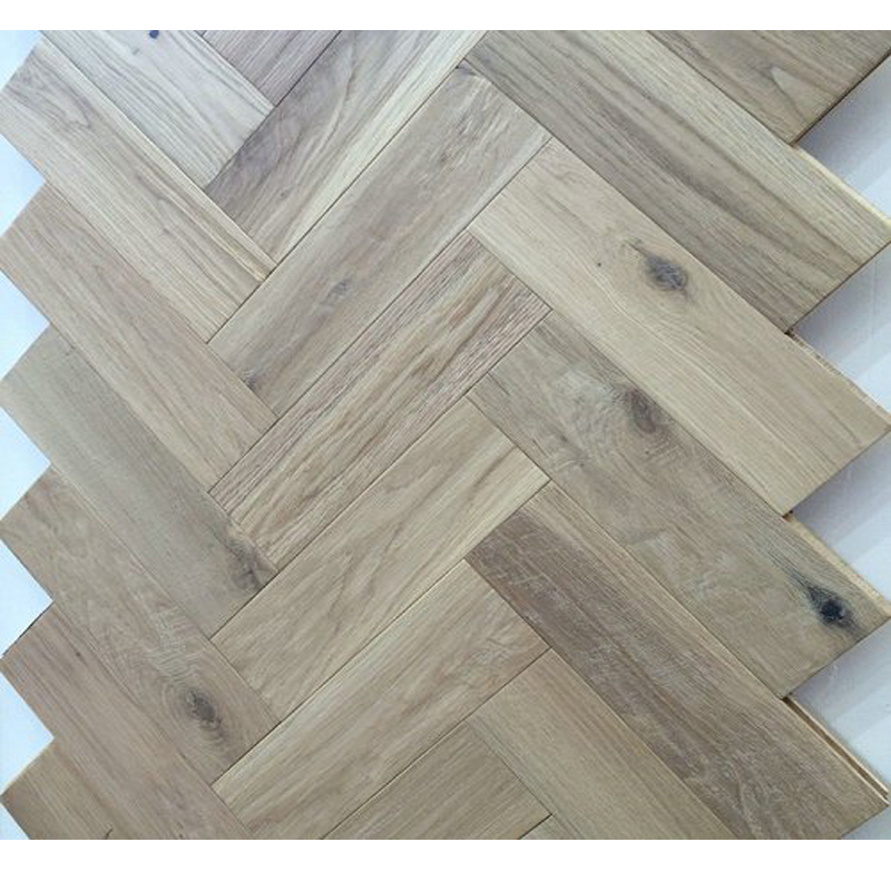 Stylish Fishbone Wood Floor - Durable & Versatile Design