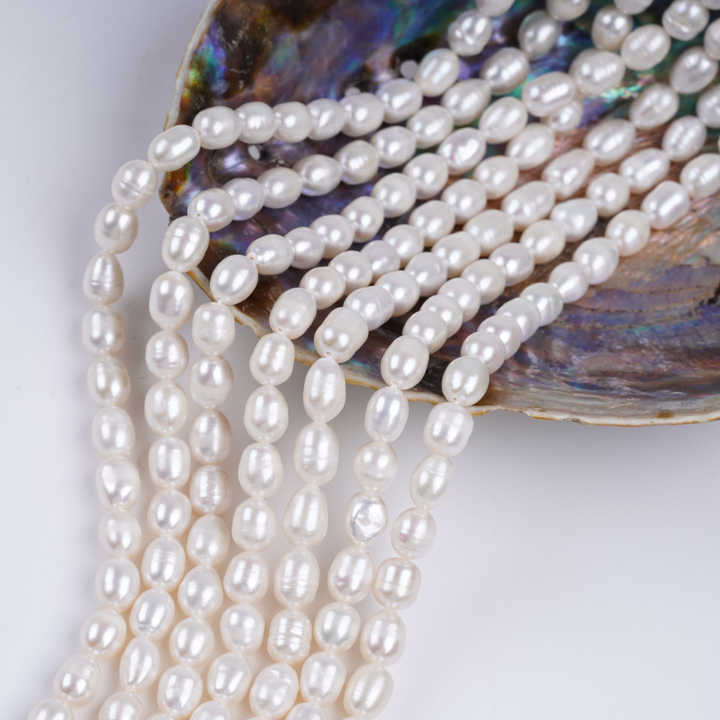 Zhuji 6-7mm White Natural Freshwater Rice Shape Pearl Loose Pearls for ...