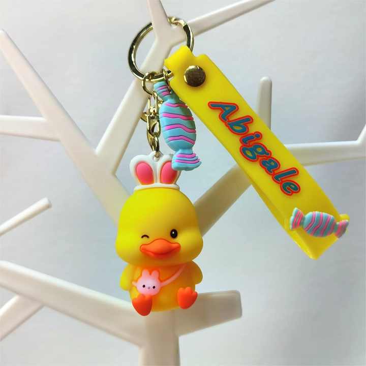 Cute Rabbit Ears Key Chain with Yellow & Pink Rubber Duck Hanging ...