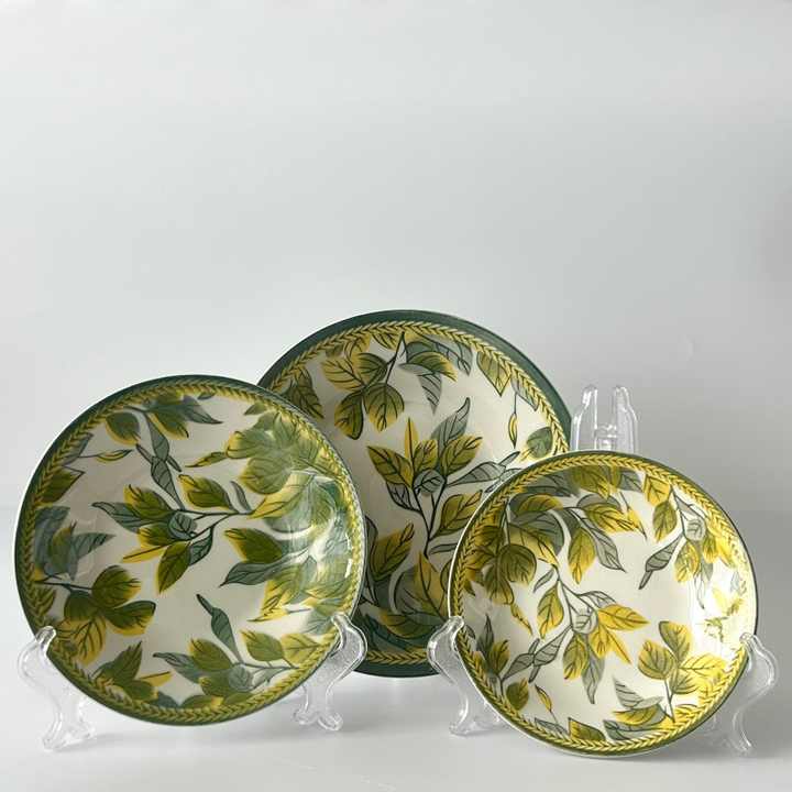 Vibrant Ceramic Dinnerware Set with Leaf Design and Warm Color Palette ...